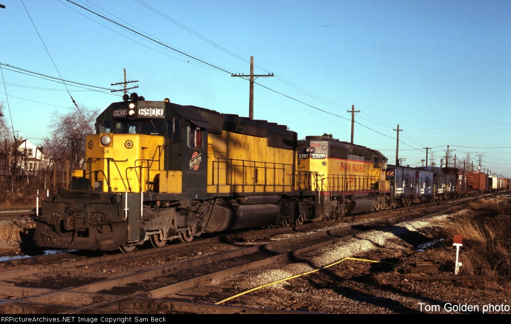CNW 6903 and UP 3397